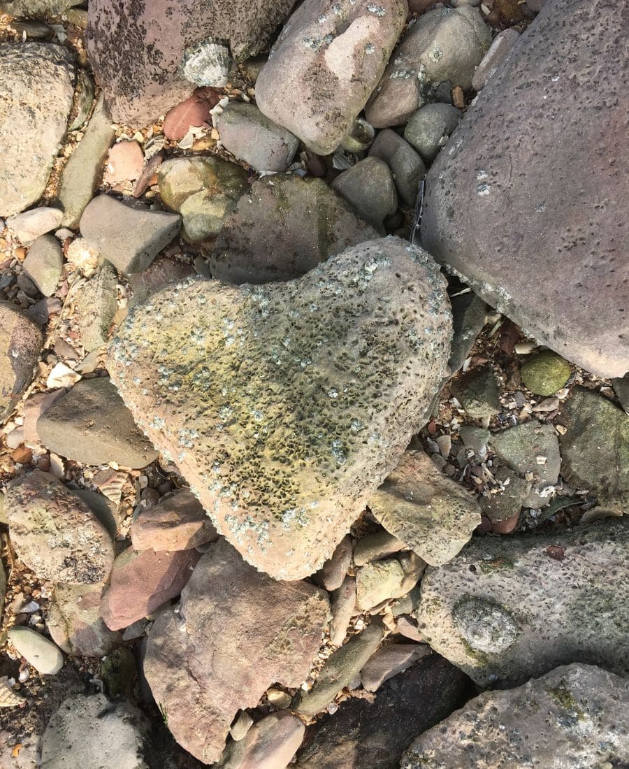 9 Spiritual Meanings of Finding Heart-Shaped Rocks in 2024